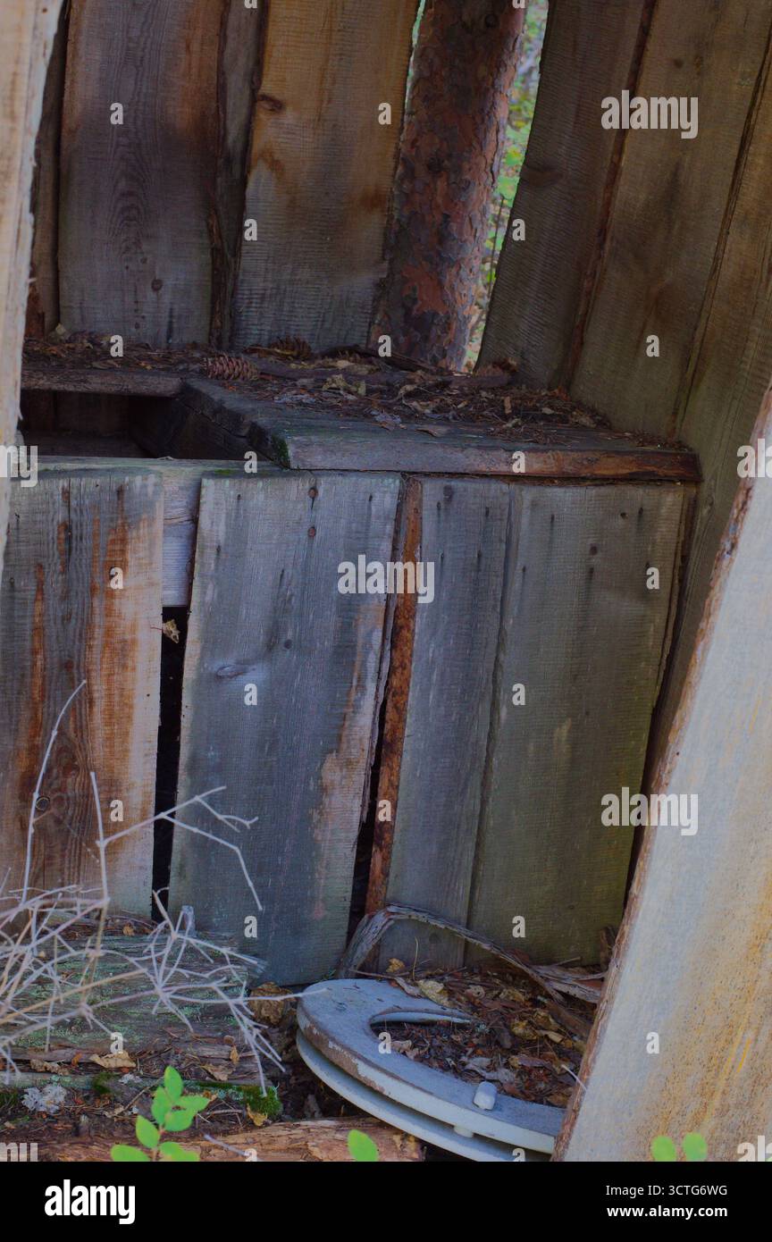 Weathered dilapidated Wooden Outhouse toilet seat With Hidden Hole In ...