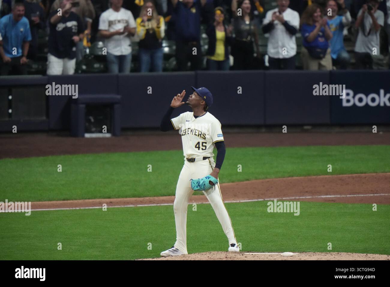 Milwaukee Brewers relief pitcher Abner Uribe (45) gestures after ...