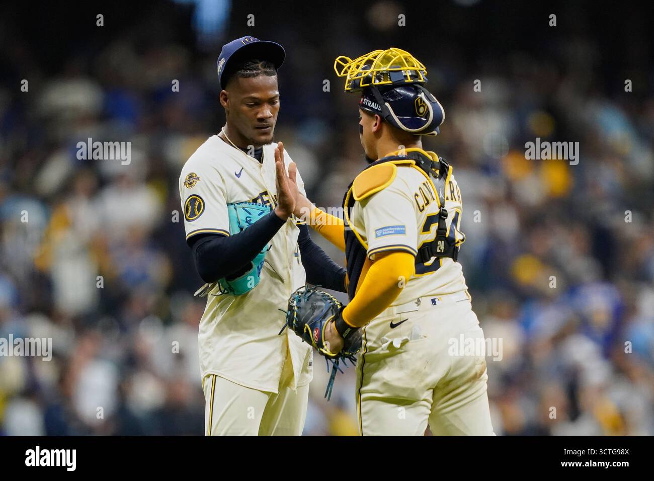 Milwaukee Brewers relief pitcher Abner Uribe (45) and catcher William ...