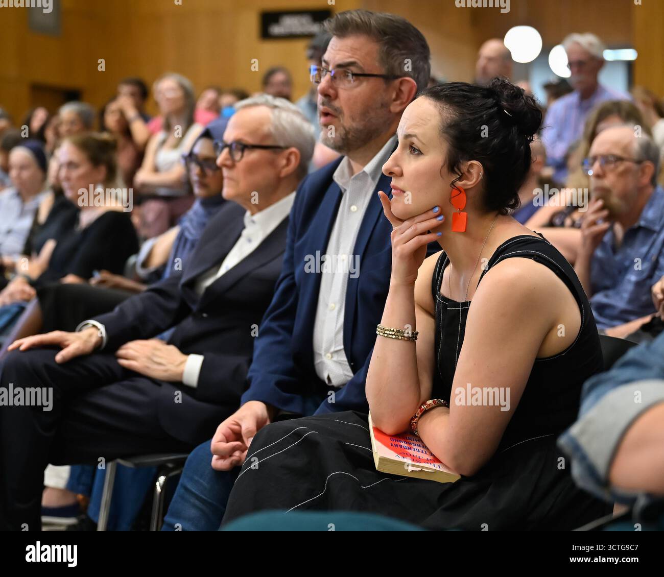 New York, USA. 06th Oct, 2025. Actor and playwright Kate Hamill (front) attends a Banned Books ...