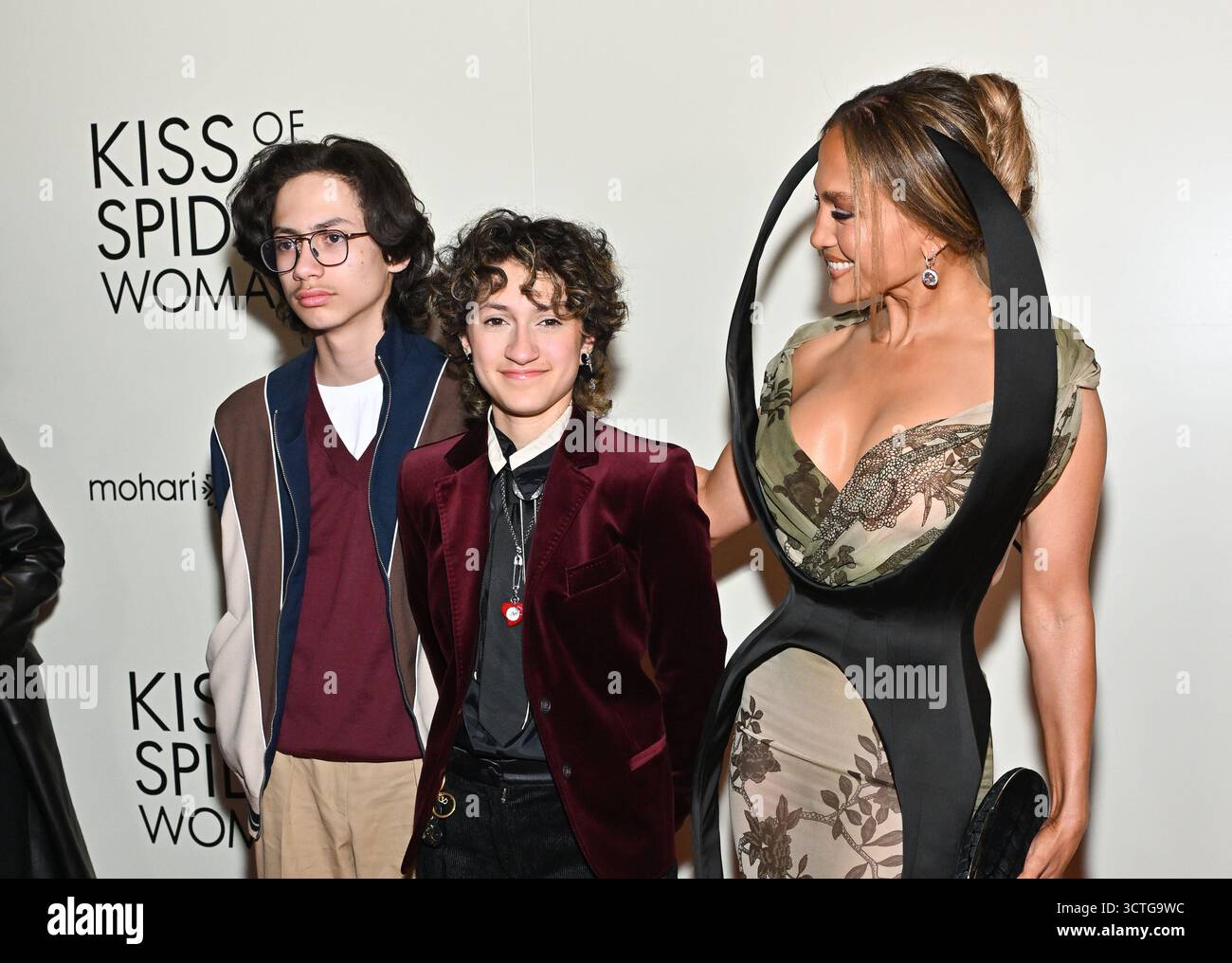 Jennifer Lopez, right, poses with her children Max Muñiz, left, and ...