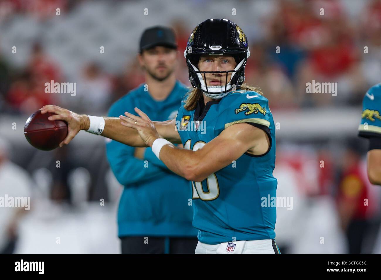 Jacksonville Jaguars quarterback Trevor Lawrence (16) warms up before ...