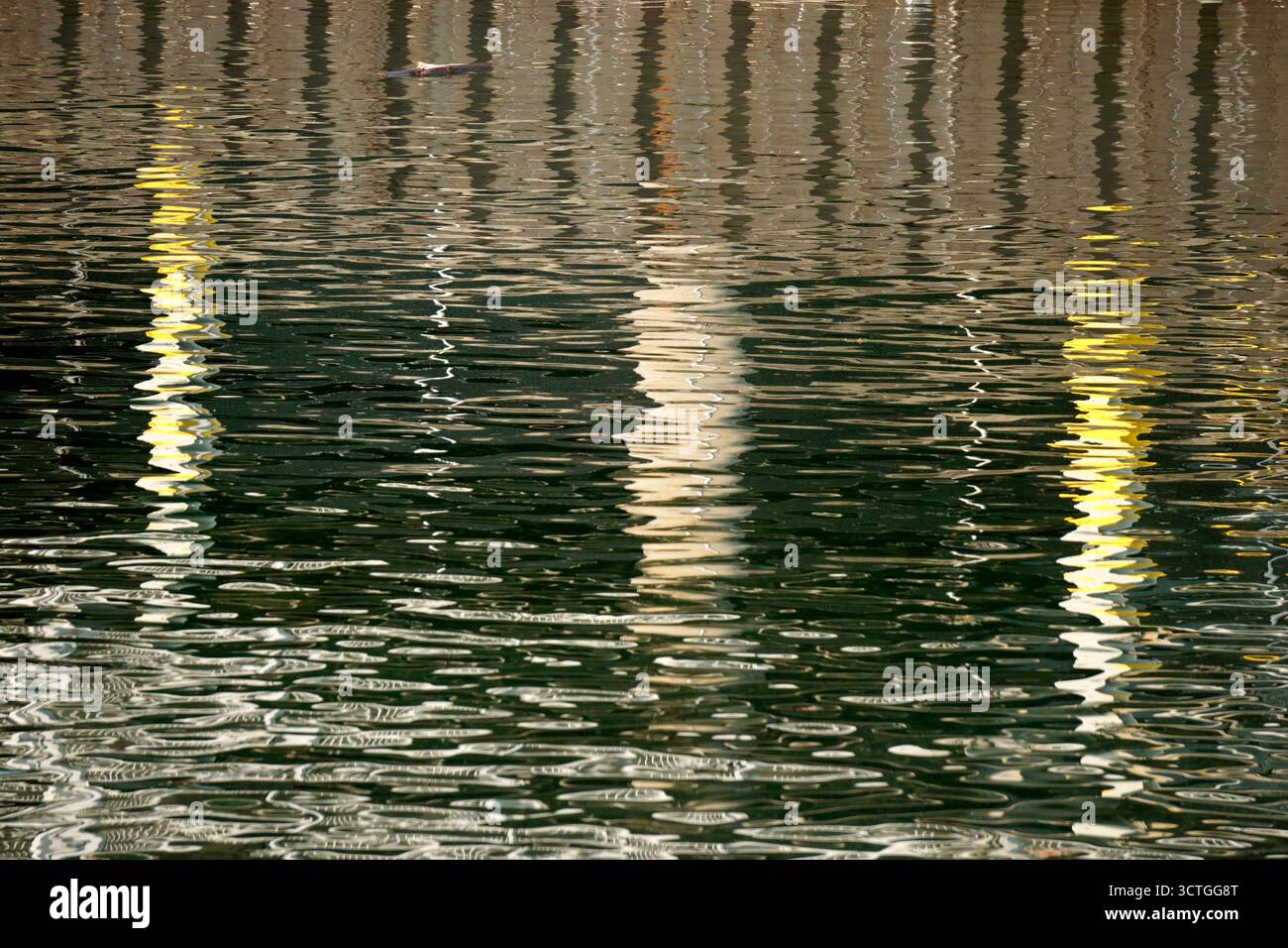 Reflections in rippling water forming an abstract design Stock Photo ...
