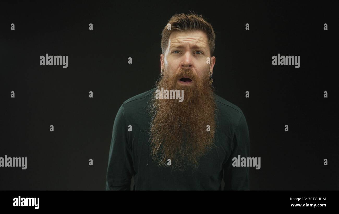 Man long ginger beard grimacing hi-res stock photography and images - Alamy