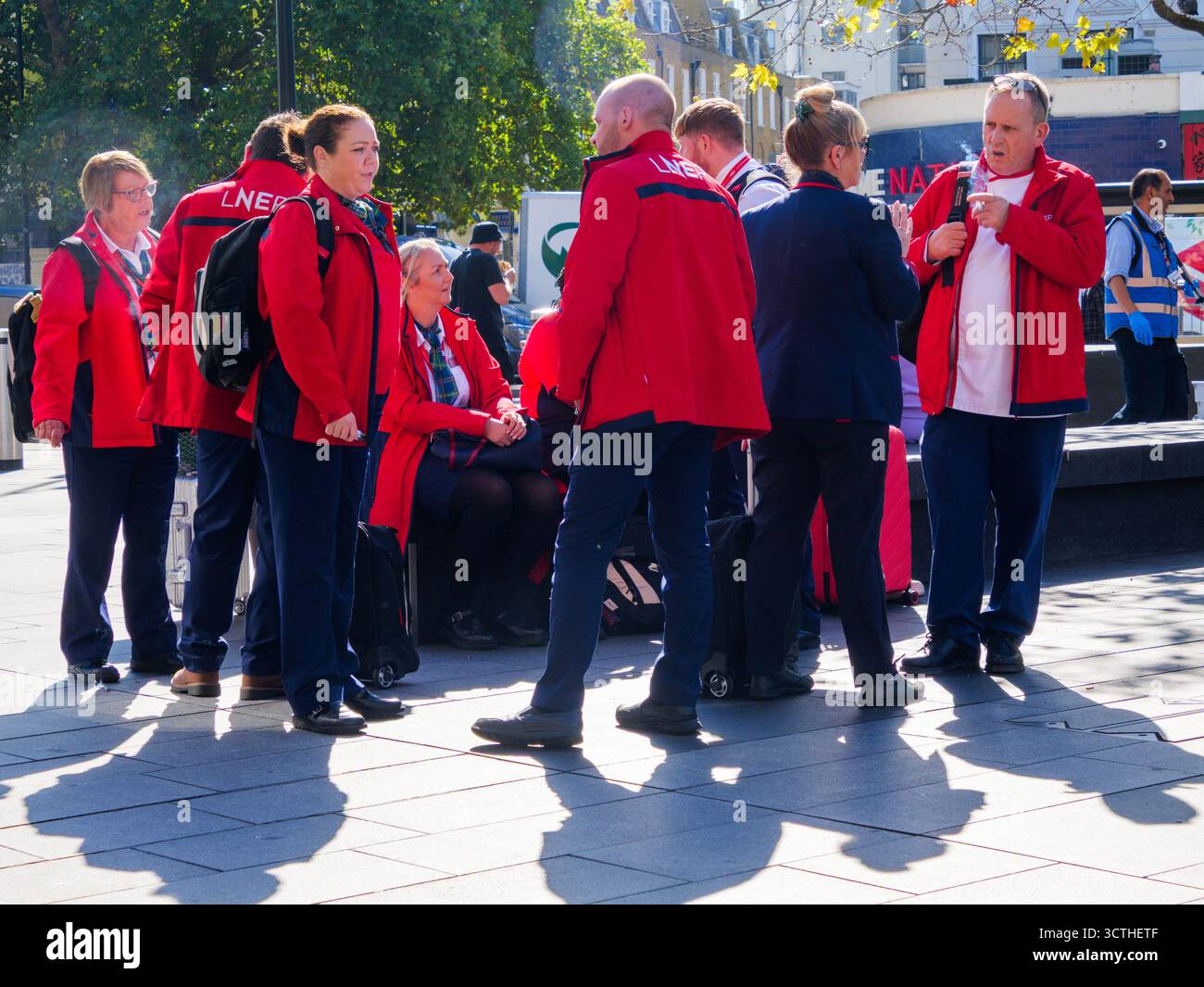 LNER railway staff take a break, near Kings Cross station London UK ...