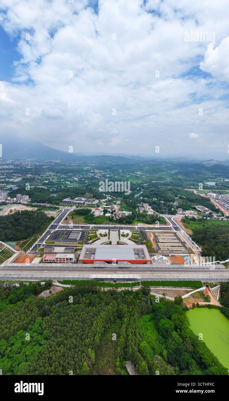Aerial photography of Luofushan Station on Guangshan High speed Railway ...