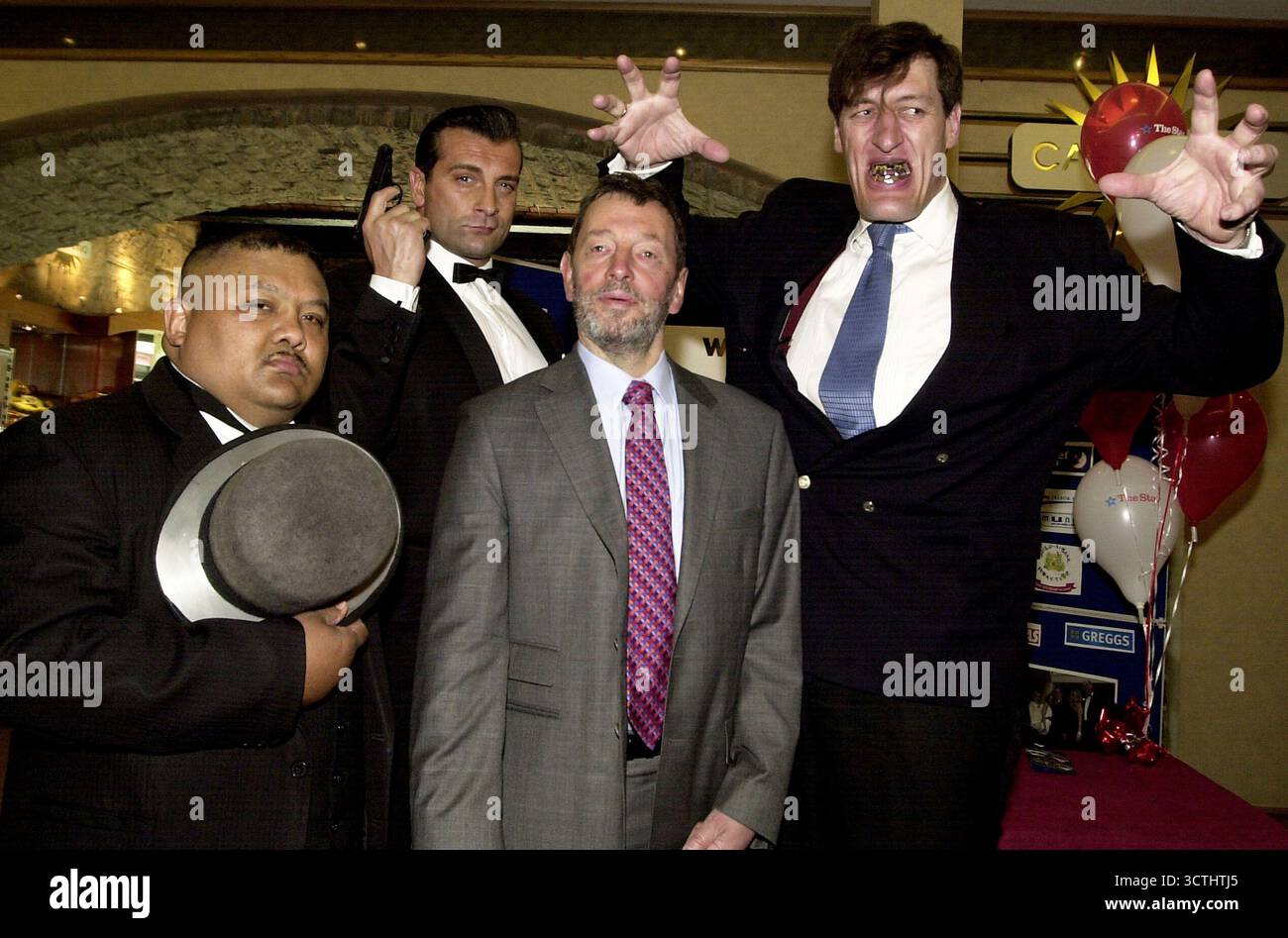 David Blunkett with James Bond character look-a-likes at the Superkids ...