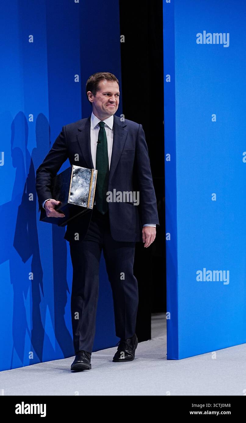 Shadow justice secretary Robert Jenrick, carrying a black box, arrives ...