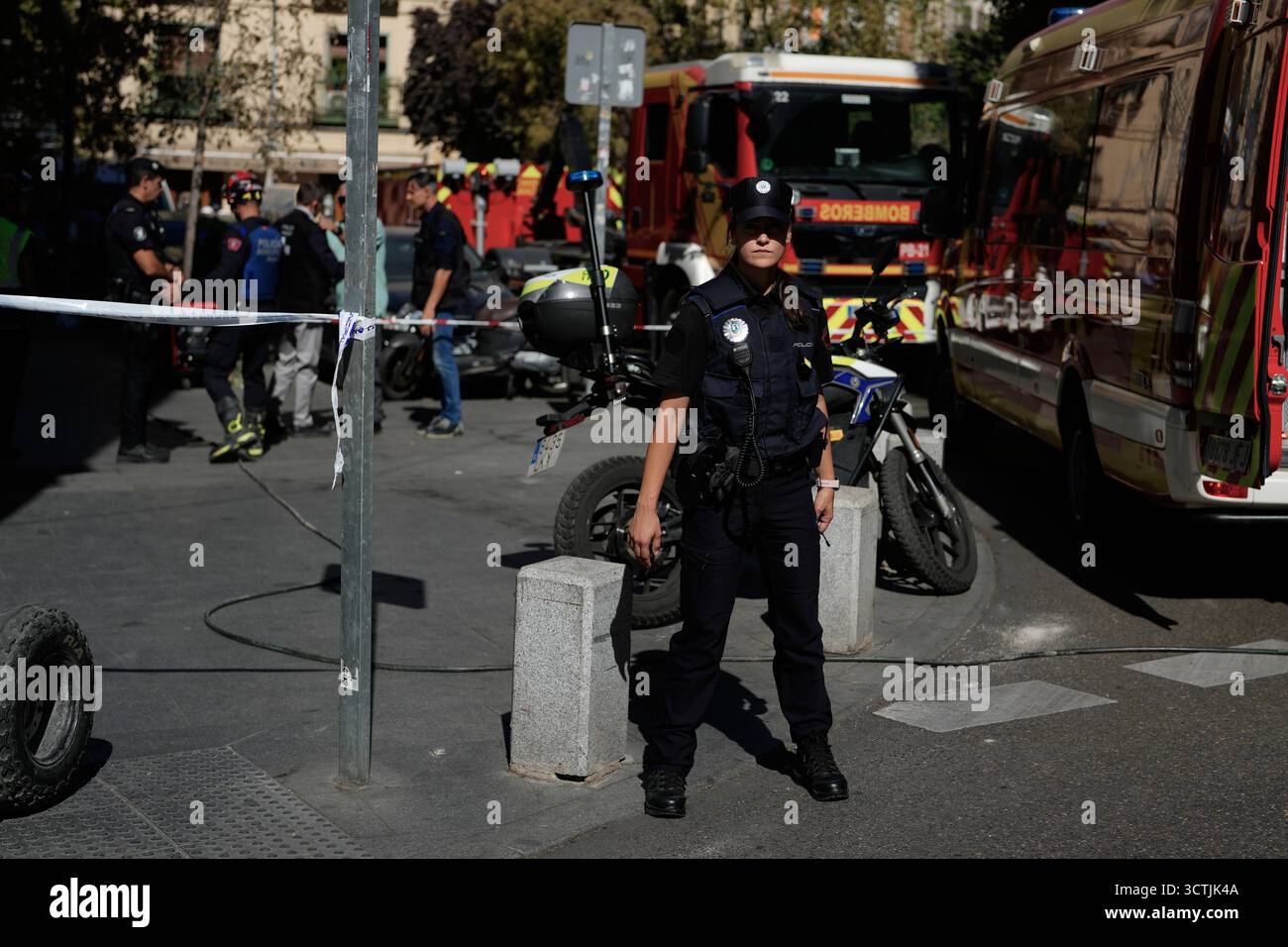 Police rope off an area as emergency personnel respond to the scene of ...