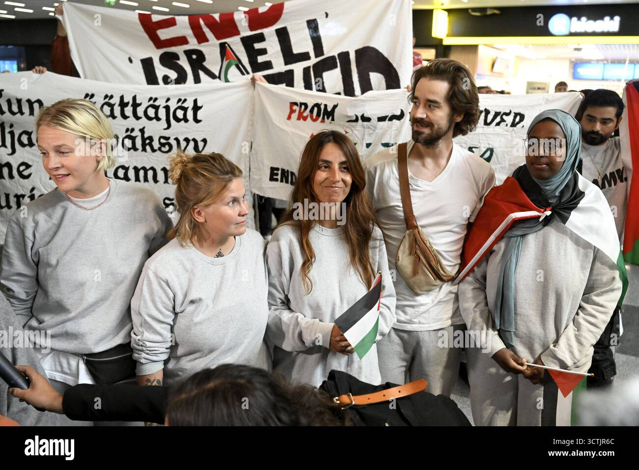 Five Finnish activists, Iida-Liina Häkkinen (L to R), Kata-Riina Tikka ...