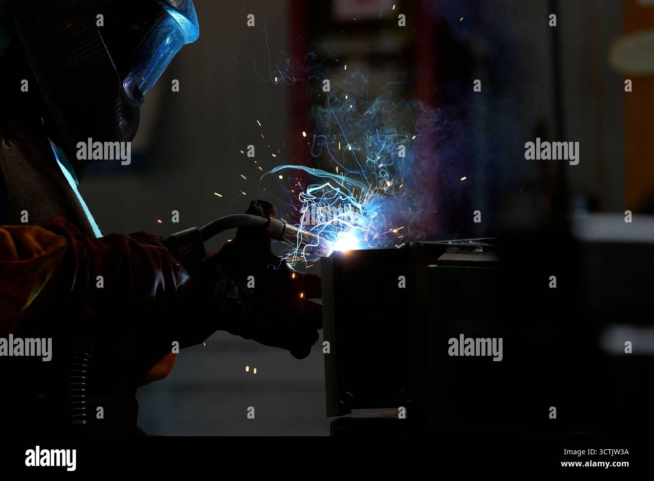 FILE -A man works at MAP, a factory operating in design, manufacture ...