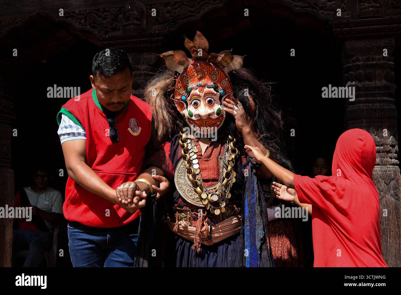 Lalitpur, Nepal. 7 October 2025. Masked dancers portraying deities of ...