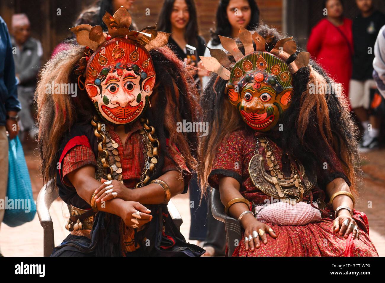 Lalitpur, Nepal. 7 October 2025. Masked dancers portraying deities of ...