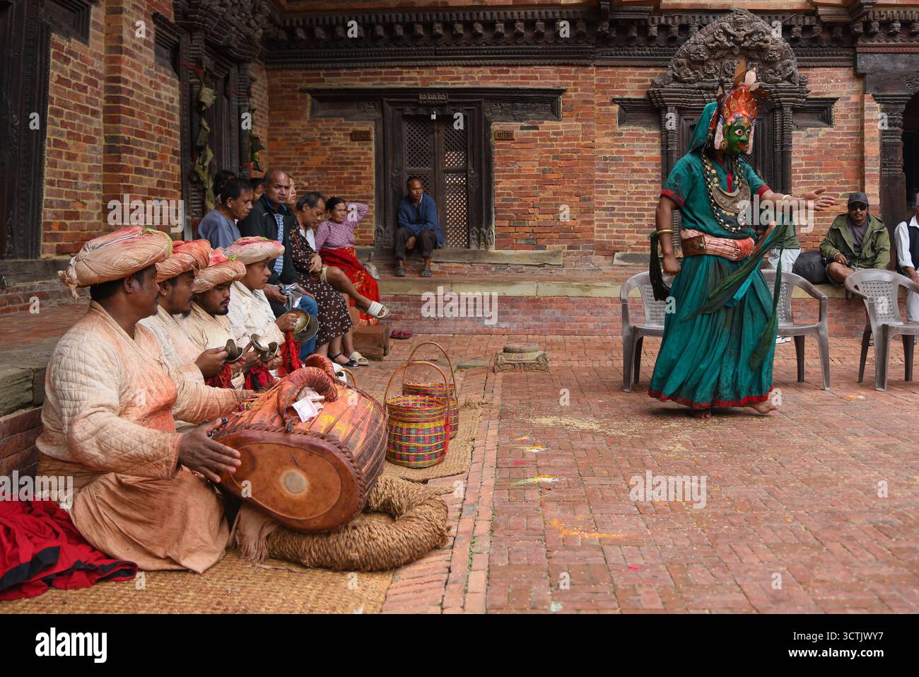 Lalitpur, Nepal. 7 October 2025. Masked dancers portraying deities of ...