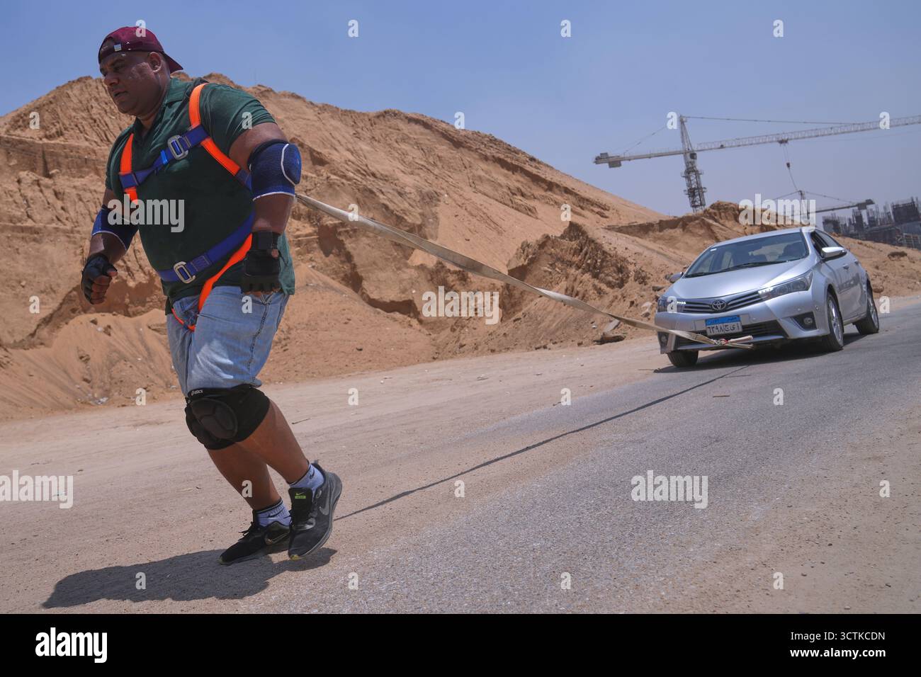Egyptian wrestler Ashraf Mahrous, also known as Kabonga, pulls a car ...