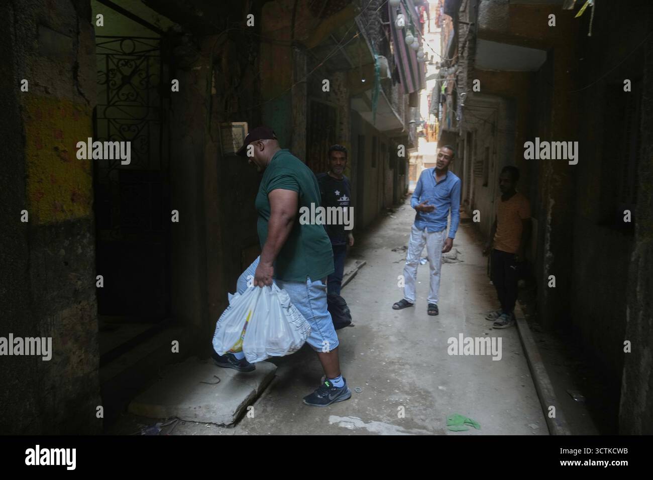 Egyptian wrestler Ashraf Mahrous, also known as Kabonga, is greeted by ...