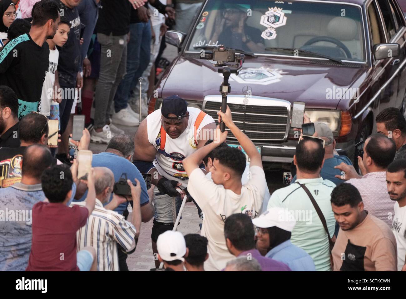 Egyptian wrestler Ashraf Mahrous, also known by his nickname Kabonga, attempts to pull 20 ...
