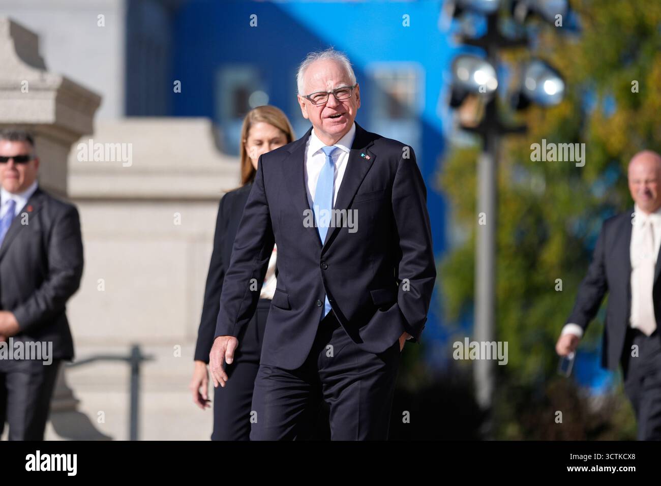 Minnesota Governor Tim Walz waits for Crown Prince Haakon of Norway to ...
