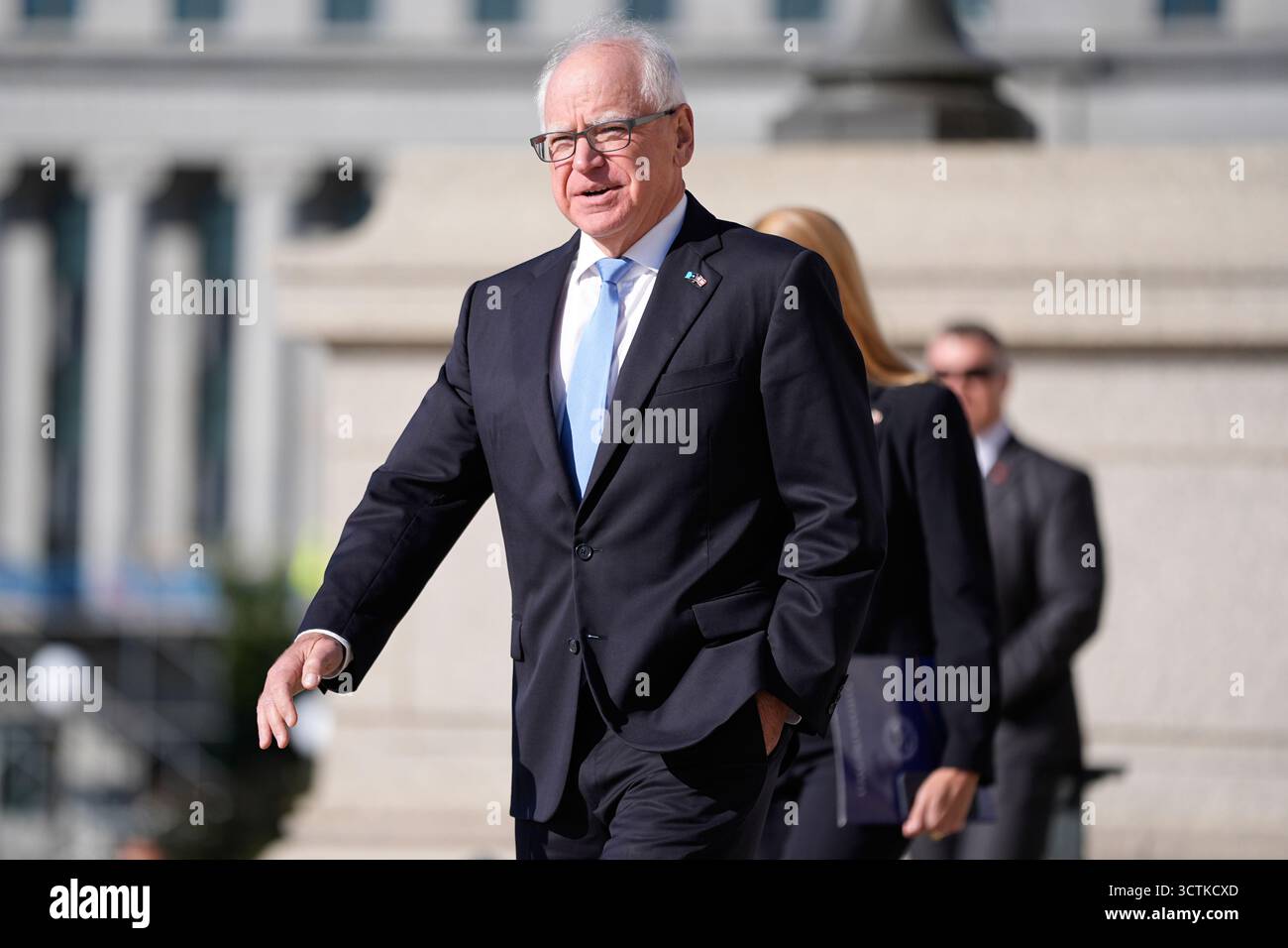 Minnesota Governor Tim Walz waits for Crown Prince Haakon of Norway to ...