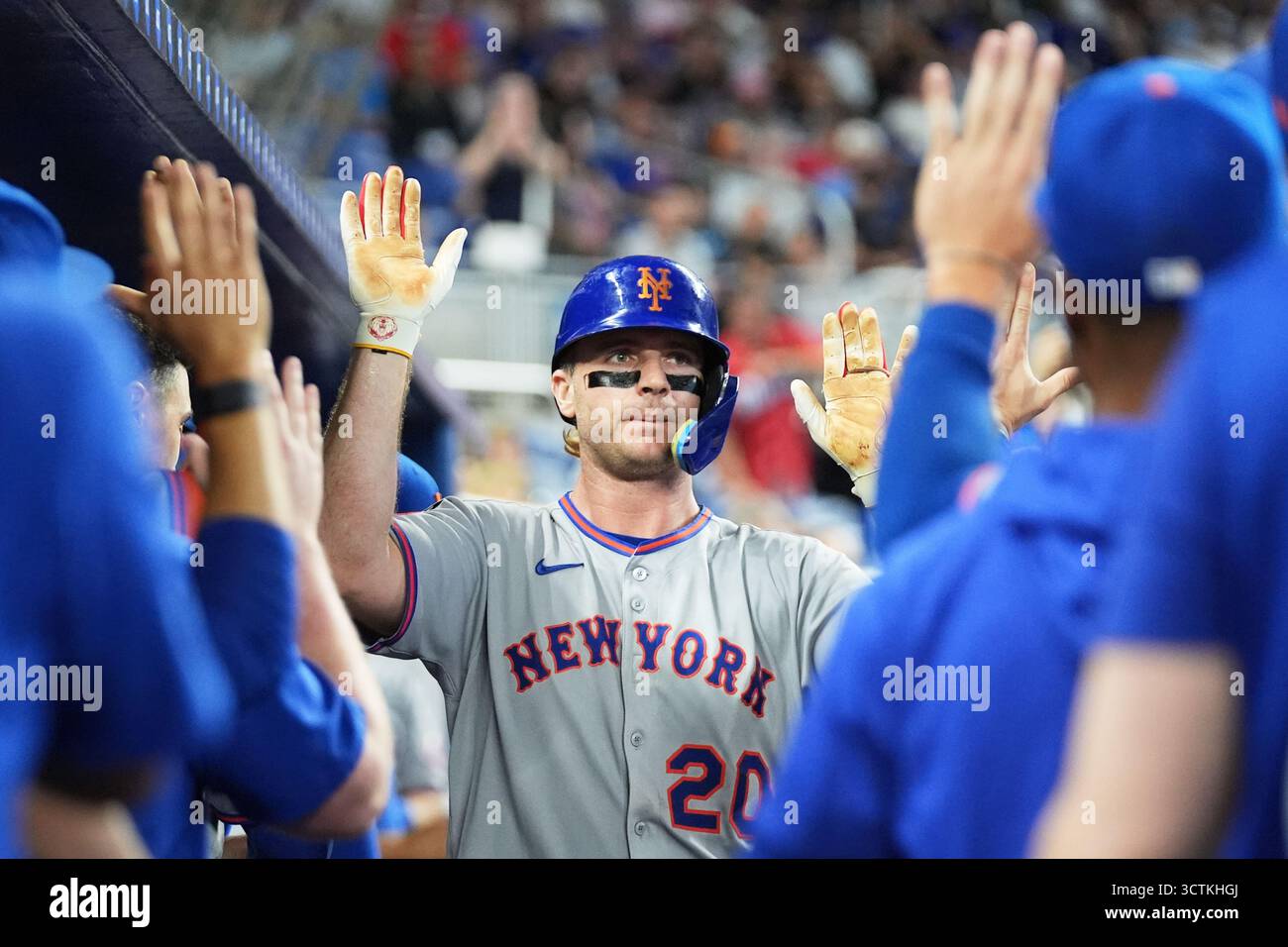 New York Mets' Pete Alonso (20) is congratulated after hitting a solo ...