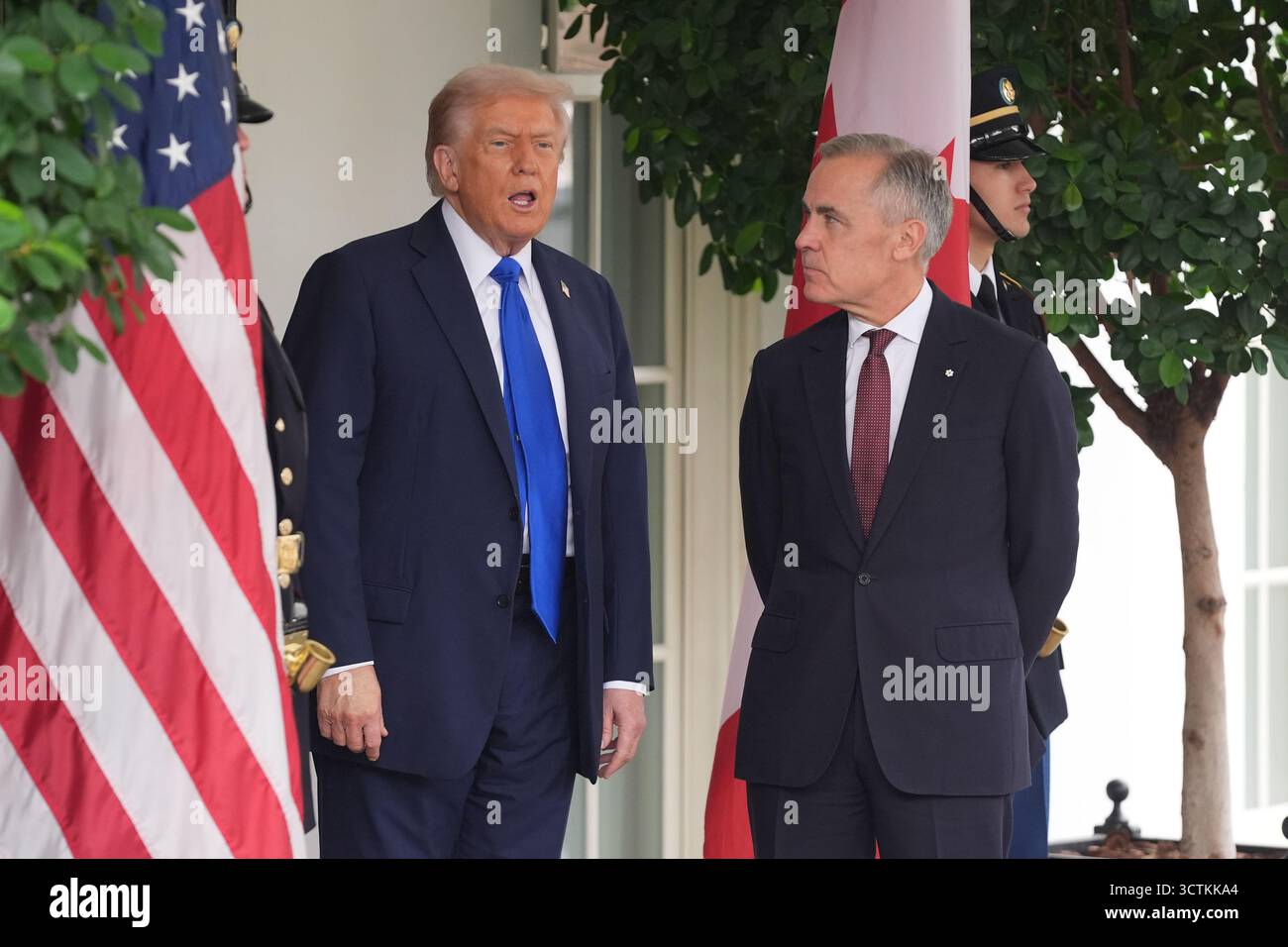 President Donald Trump greets Canadian Prime Minister Mark Carney at ...
