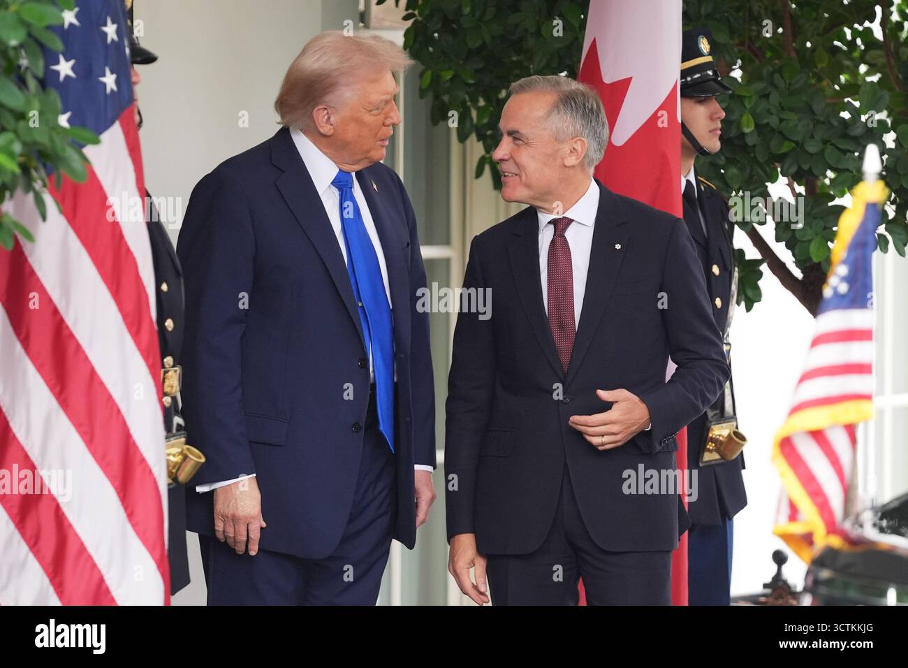 President Donald Trump greets Canadian Prime Minister Mark Carney at ...