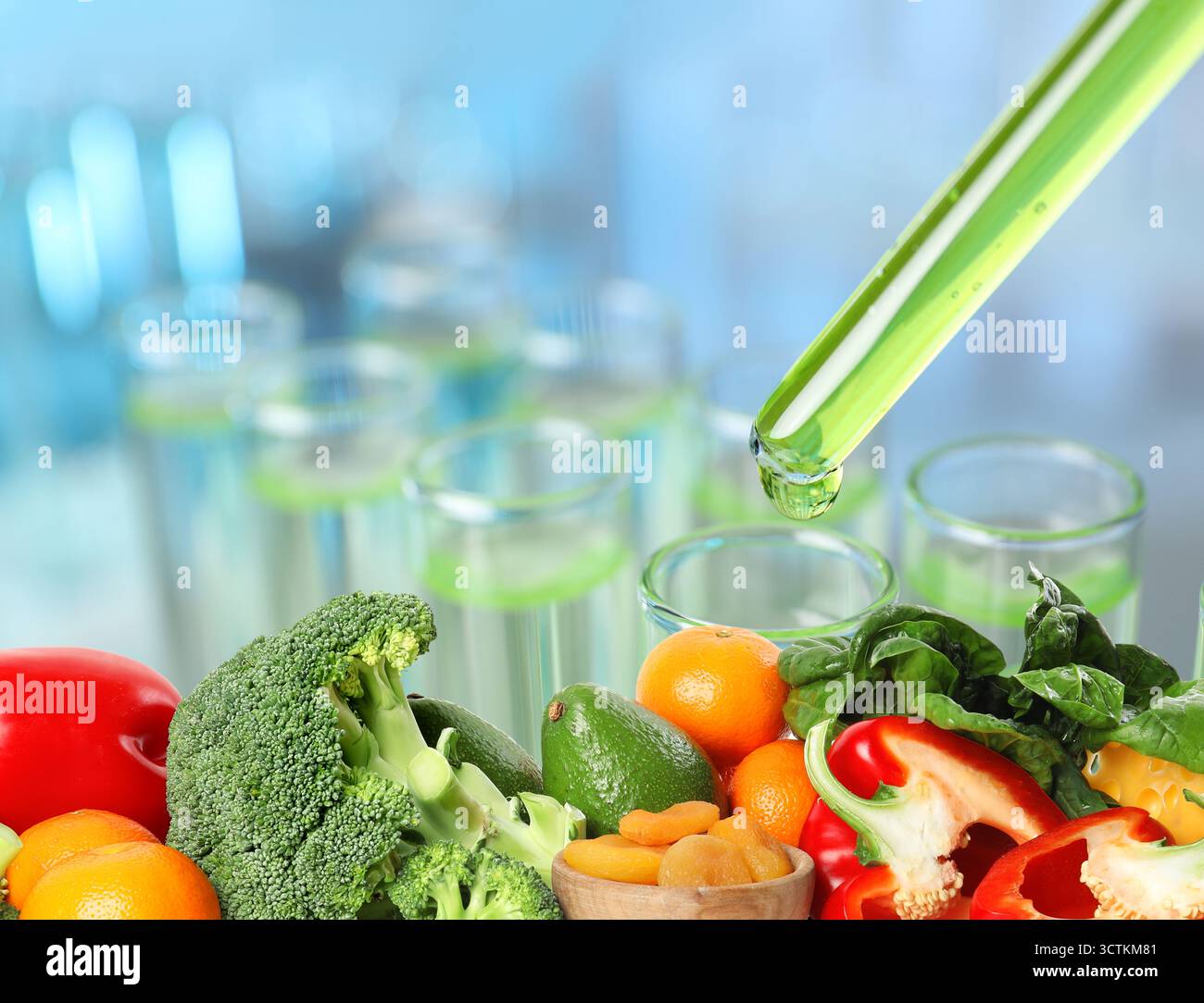 Food laboratory analysis. Test tubes and fresh products Stock Photo - Alamy