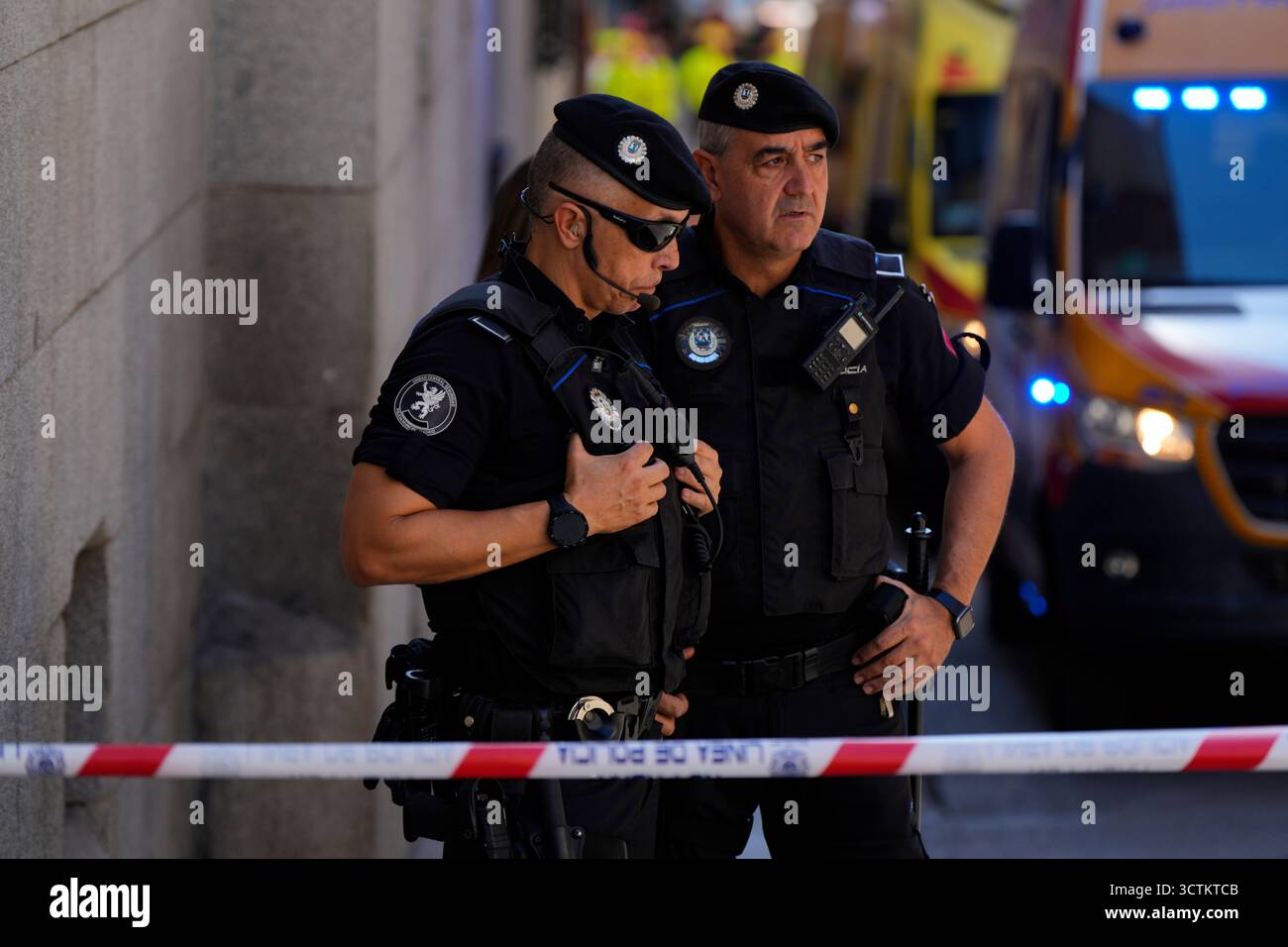 Police rope off an area of a building collapse in Madrid, Spain ...