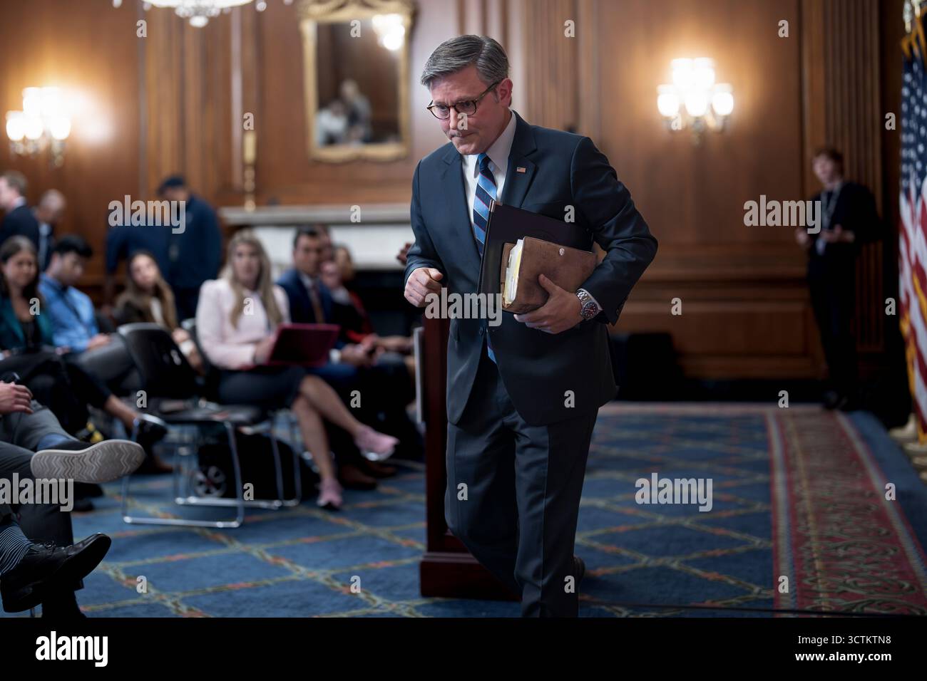 Carrying his personal Bible, Speaker of the House Mike Johnson, R-La ...