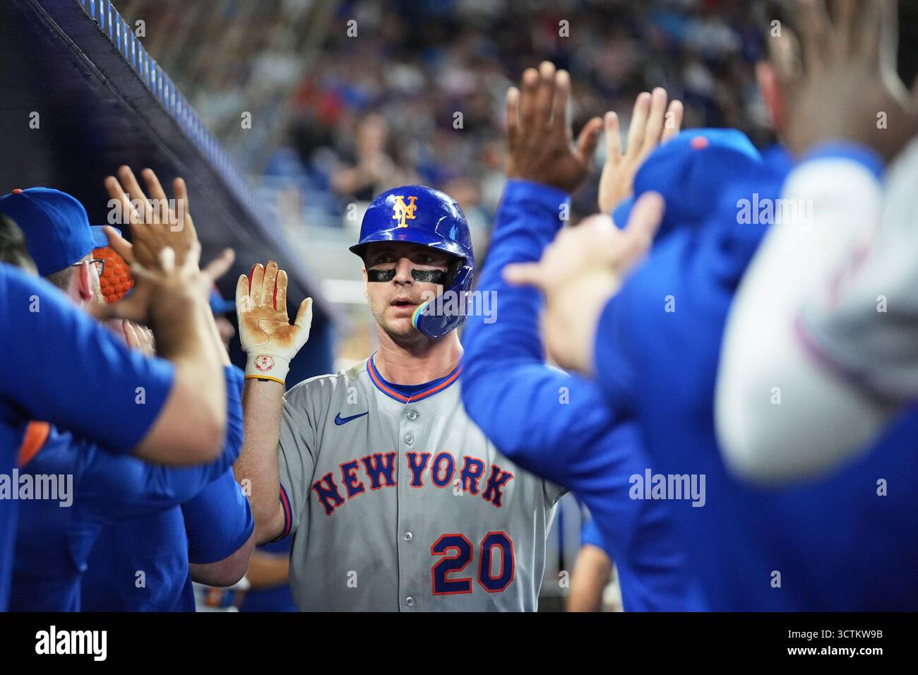 New York Mets' Pete Alonso (20) is congratulated after hitting a solo ...