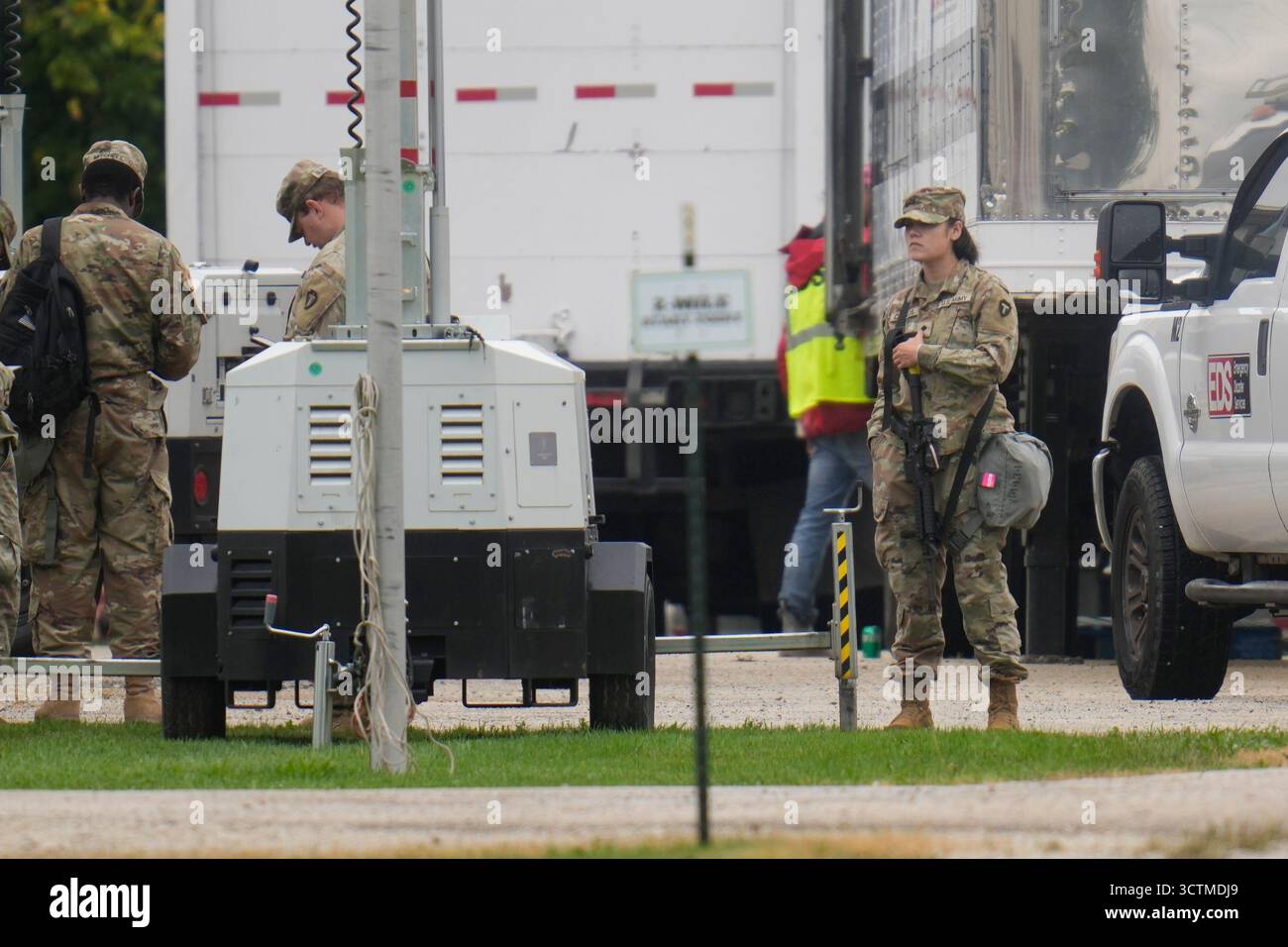 Military personnel in uniform, with the Texas National Guard patch on ...