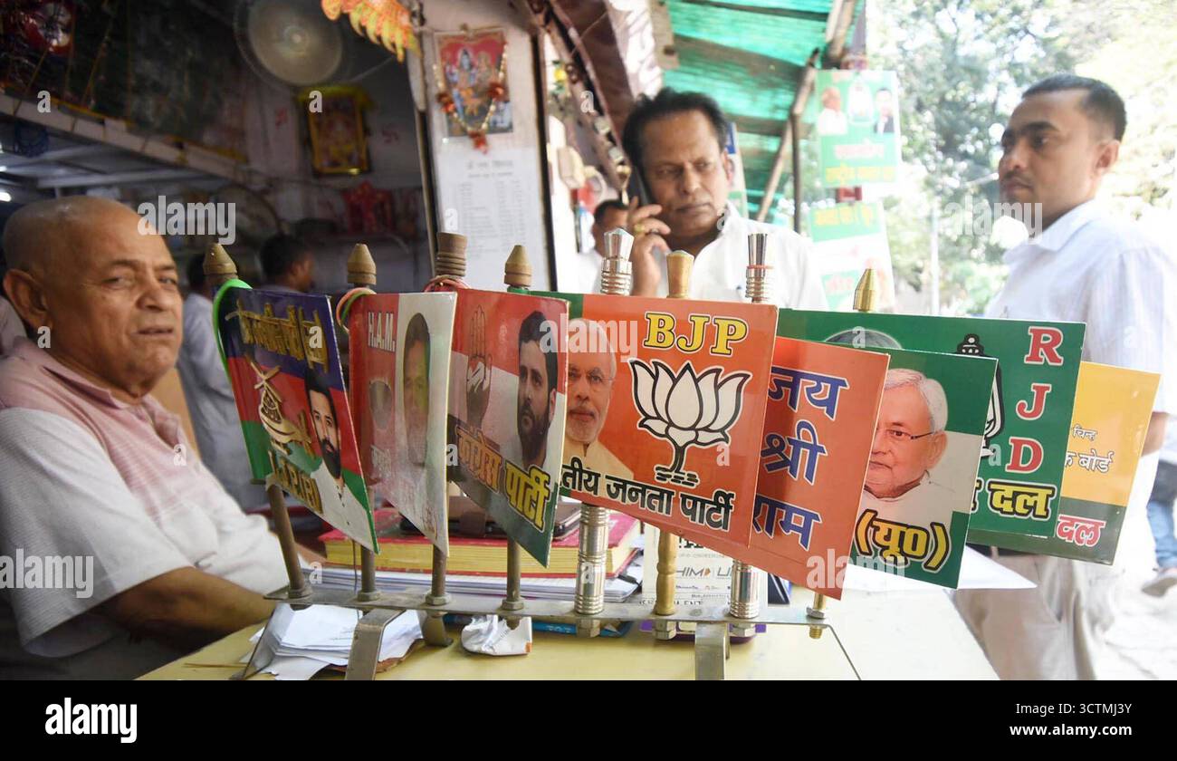 PATNA, INDIA - OCTOBER 7: Banners, flags, batches and caps of various ...
