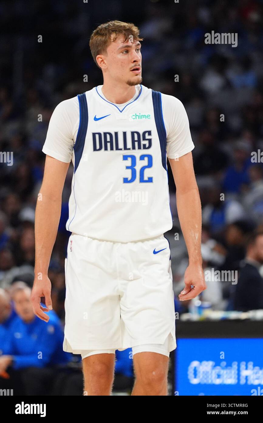 Dallas Mavericks forward Cooper Flagg walks on the court during the ...