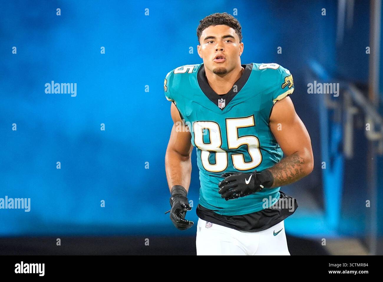 Jacksonville Jaguars tight end Brenton Strange (85) enters the field ...