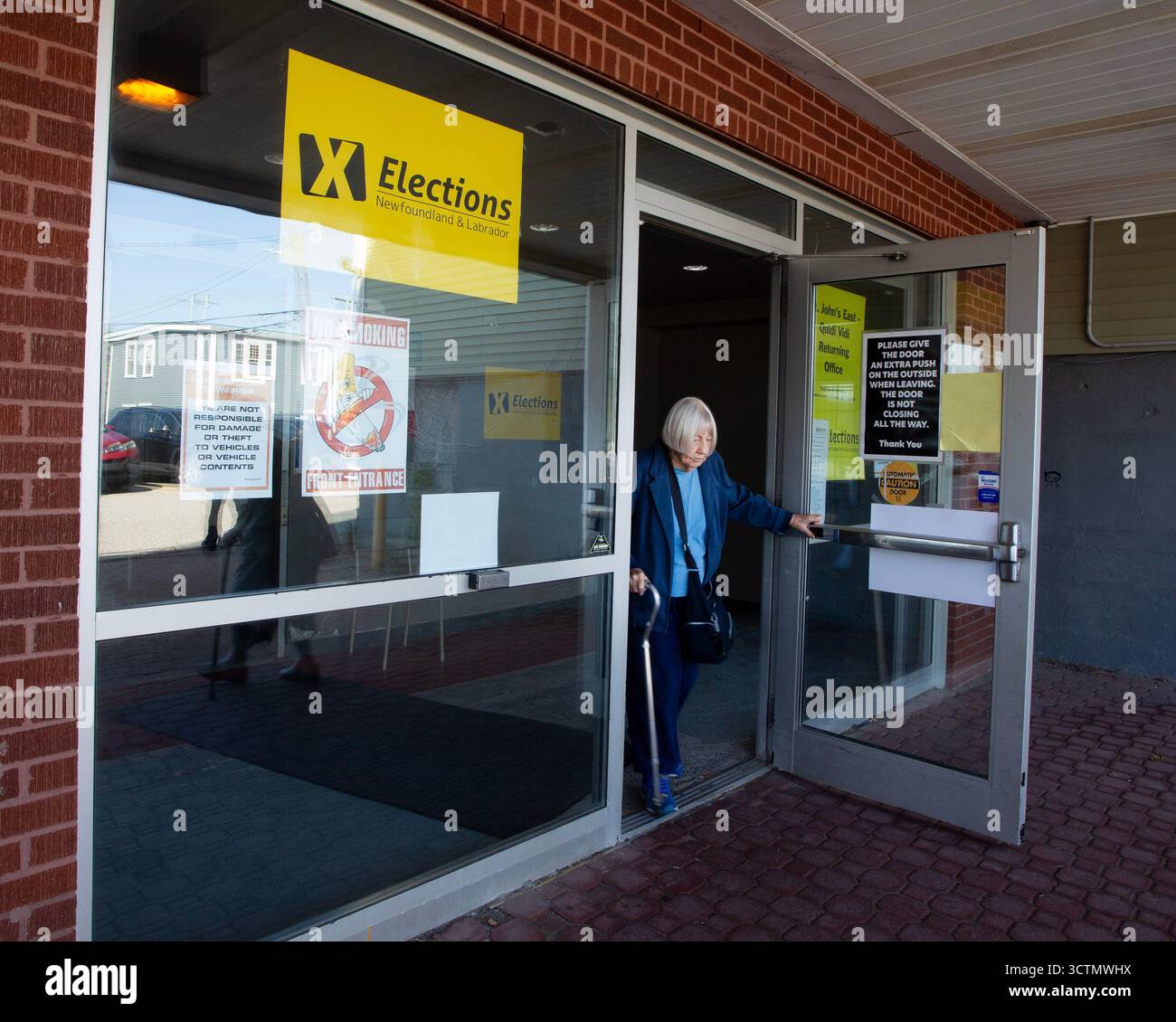 A person leaves an advance polling station in St. John's, N.L., on ...