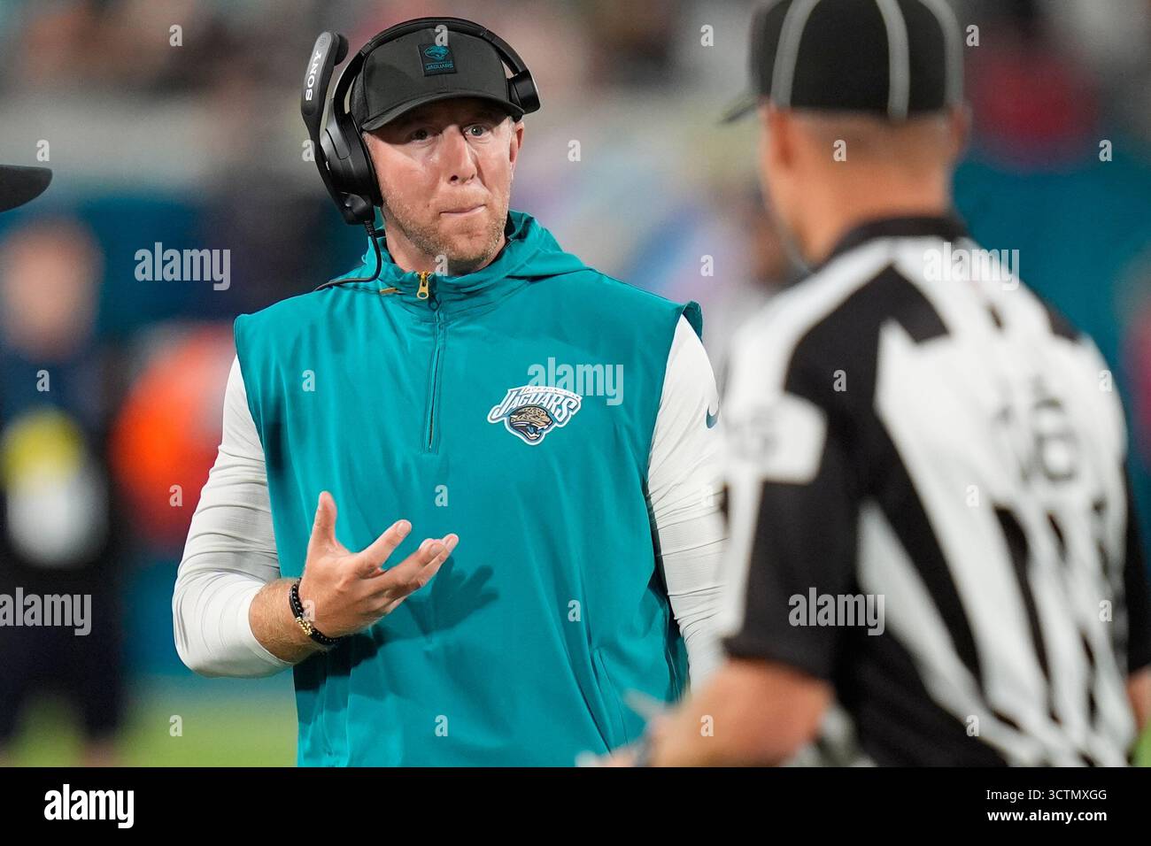 Jacksonville Jaguars head coach Liam Coen has words with an official ...