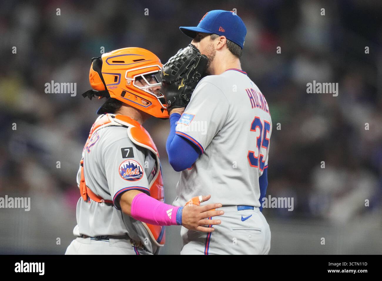 New York Mets catcher Francisco Alvarez, left, talks with starting pitcher Clay Holmes (35 ...