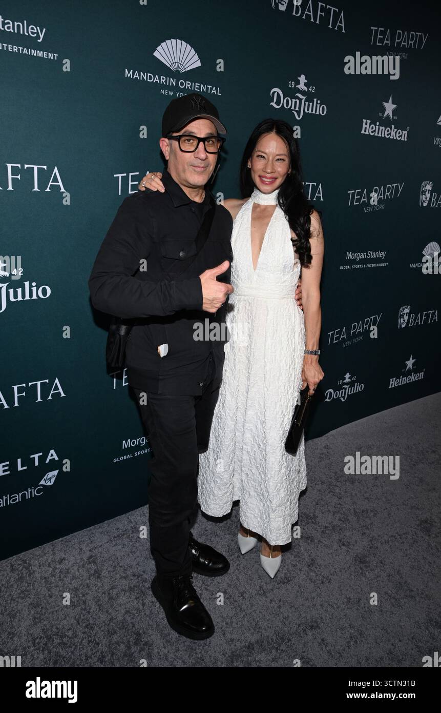 Jason Weinberg (L) and Lucy Liu attend The 2025 BAFTA NYC Tea Party at ...