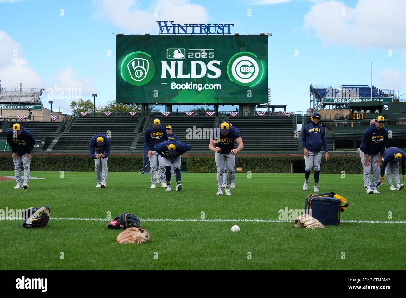 Milwaukee Brewers players loosen up during batting practice, Tuesday ...