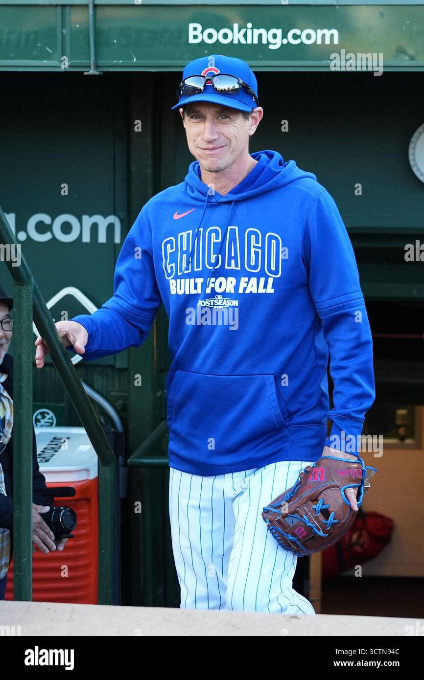Chicago Cubs manager Craig Counsell smiles as he watches players during ...