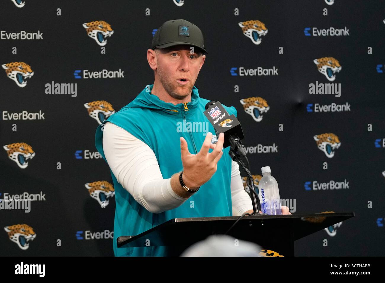 Jacksonville Jaguars head coach Liam Coen answers questions during a ...