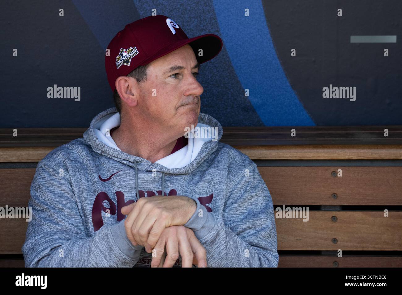 Philadelphia Phillies manager Rob Thomson sits in the dugout during ...
