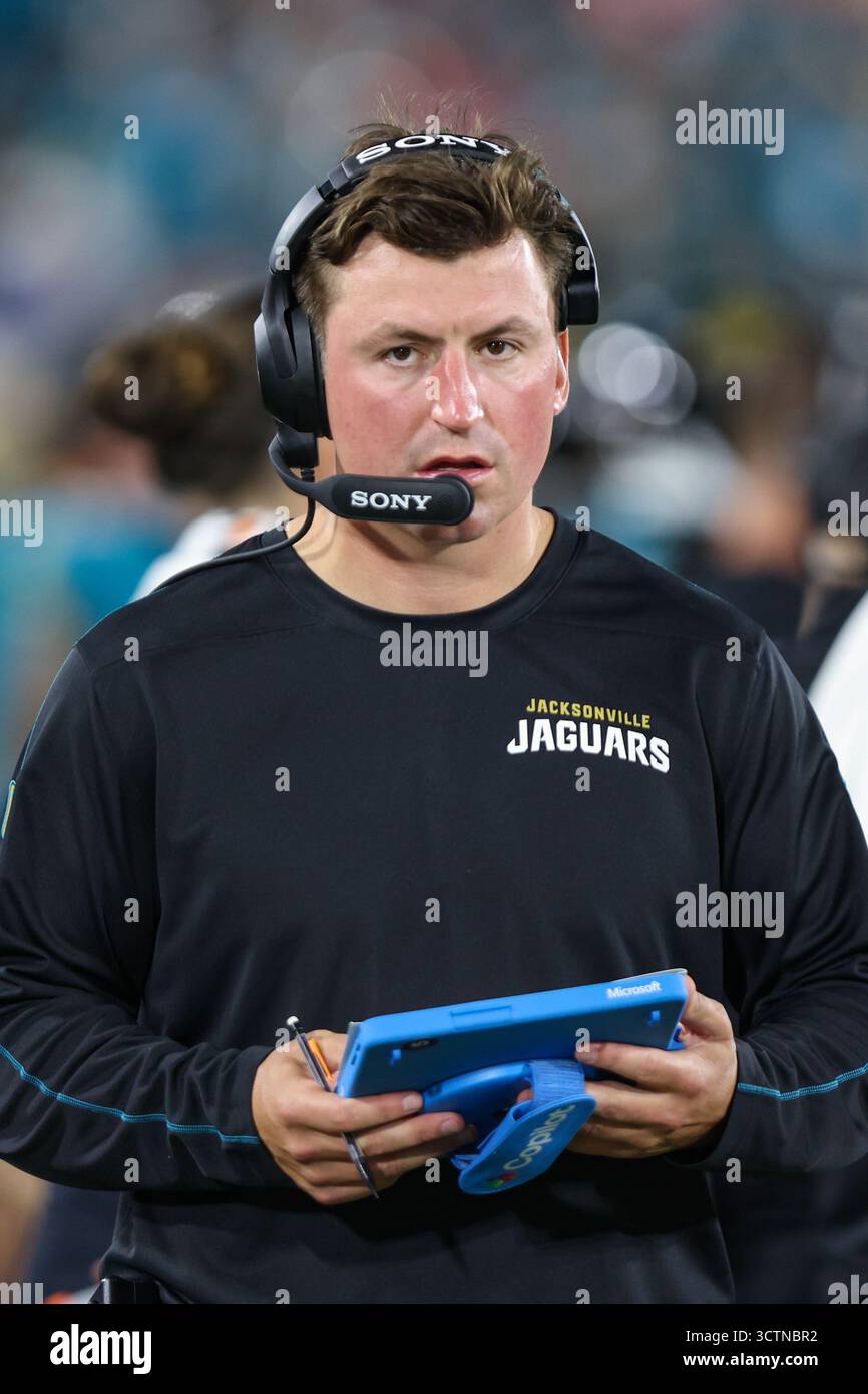 Jacksonville Jaguars offensive coordinator Grant Udinski walks the ...