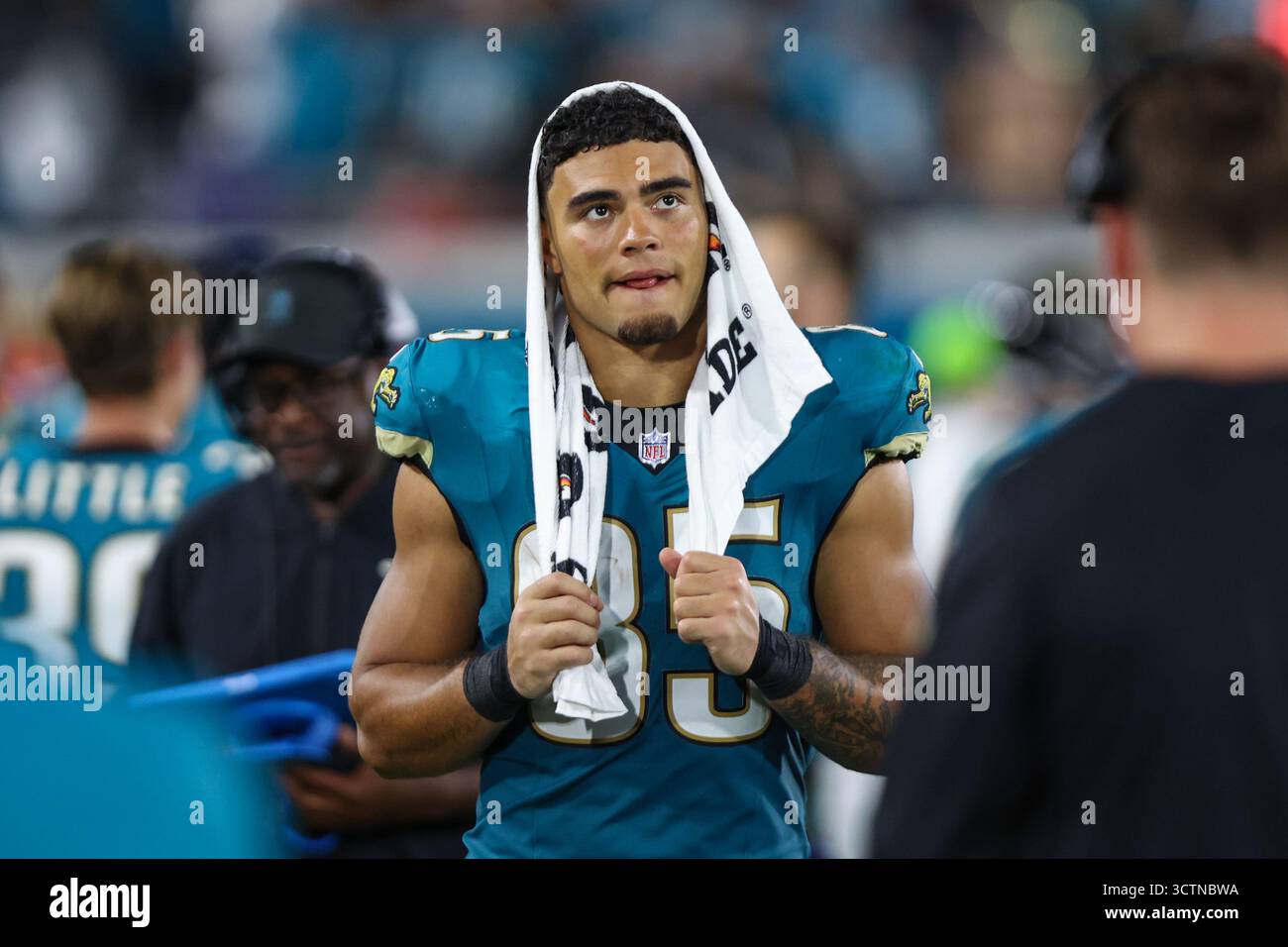 Jacksonville Jaguars tight end Brenton Strange (85) walks the sideline ...