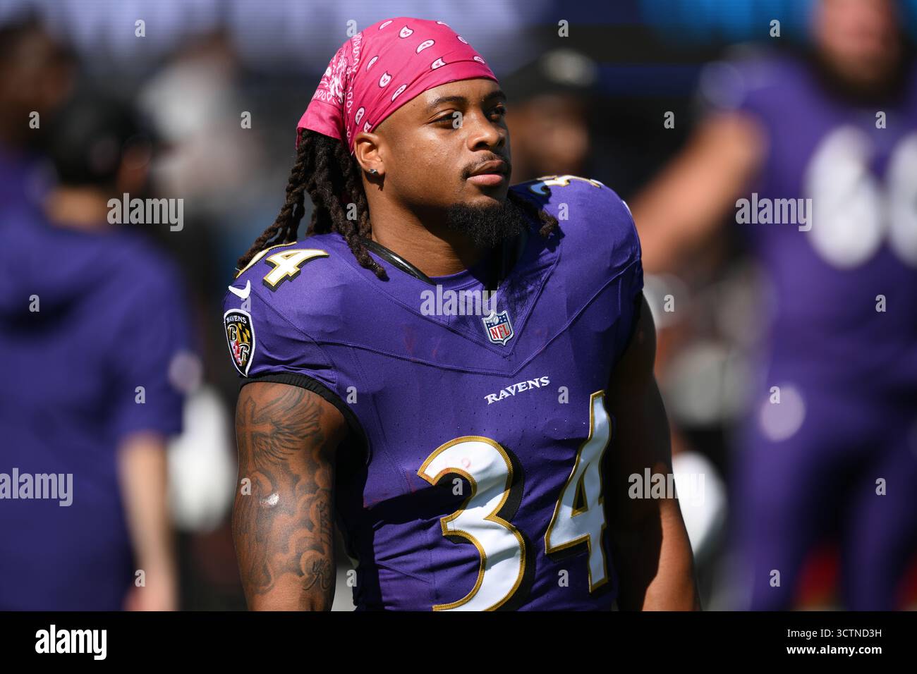 Baltimore Ravens running back Keaton Mitchell (34) warms up before an ...