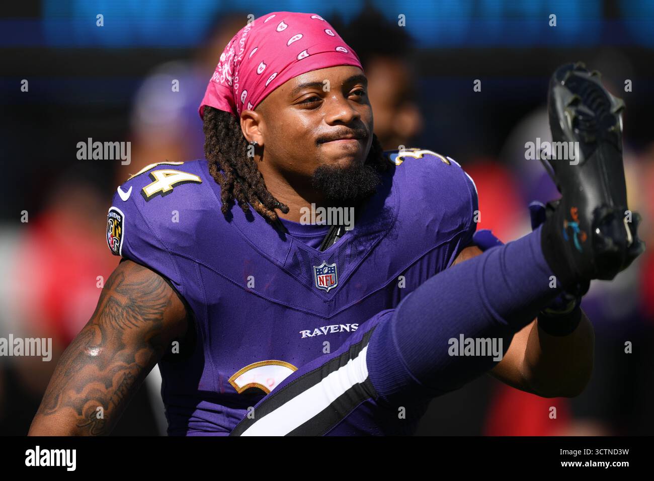Baltimore Ravens running back Keaton Mitchell (34) warms up before an ...