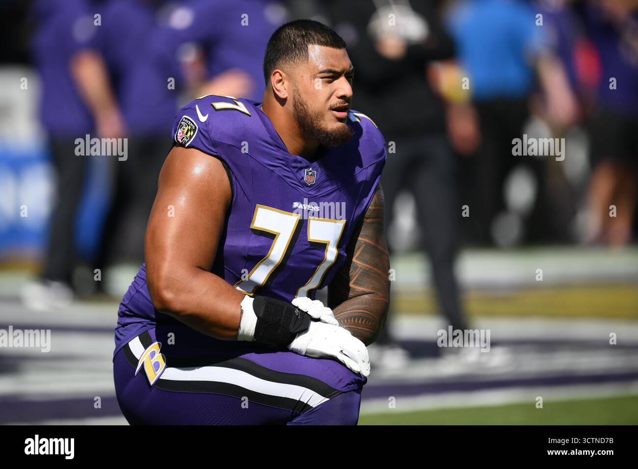 Baltimore Ravens guard Daniel Faalele (77) warms up before an NFL ...
