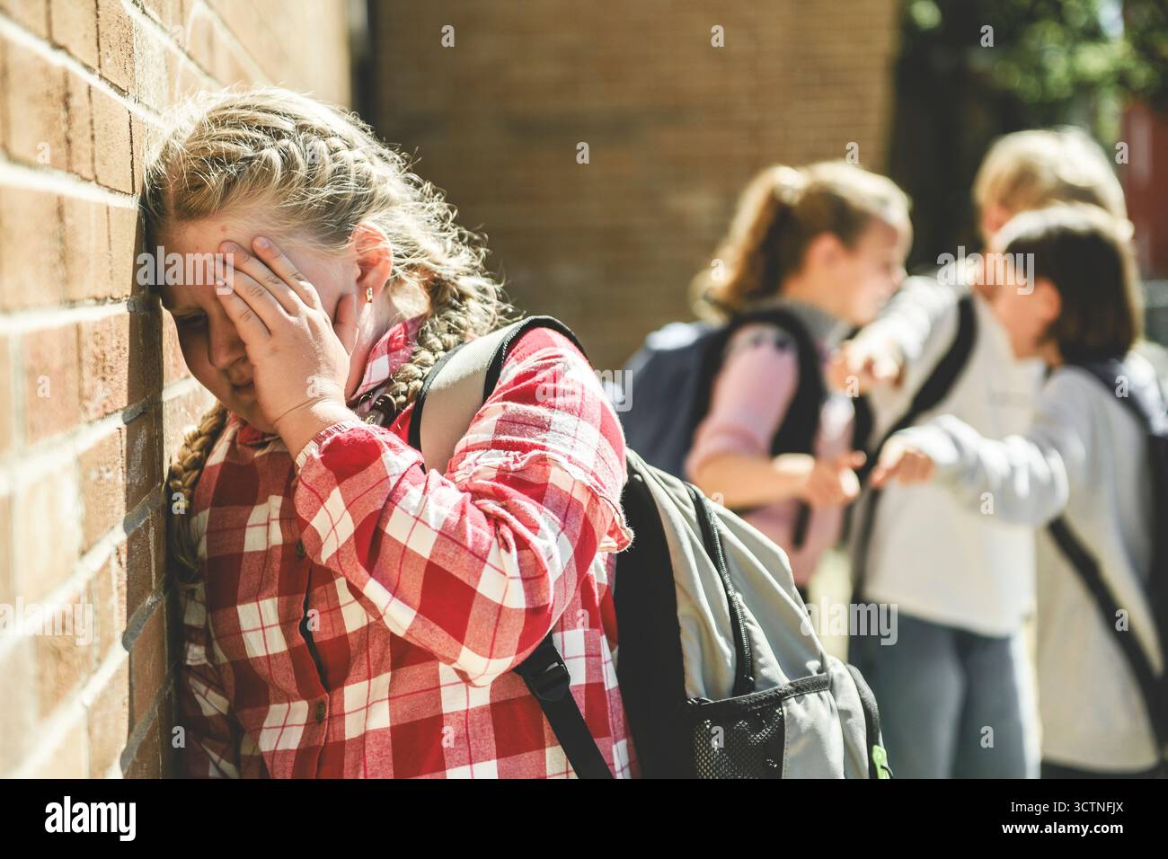 sad girl Bullying in Schoolyard with other student have some ...