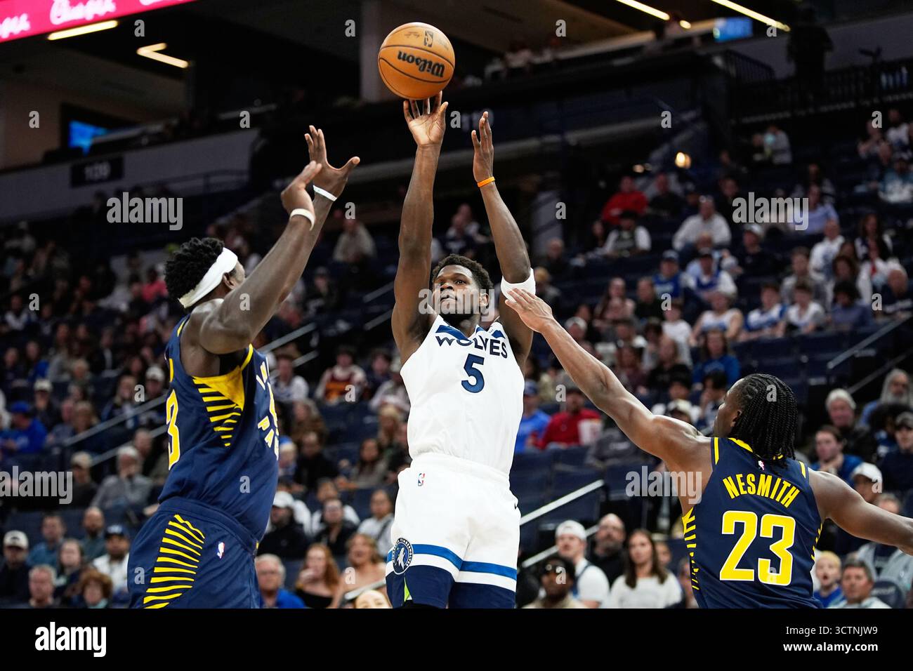 Minnesota Timberwolves guard Anthony Edwards (5) shoots over Indiana ...