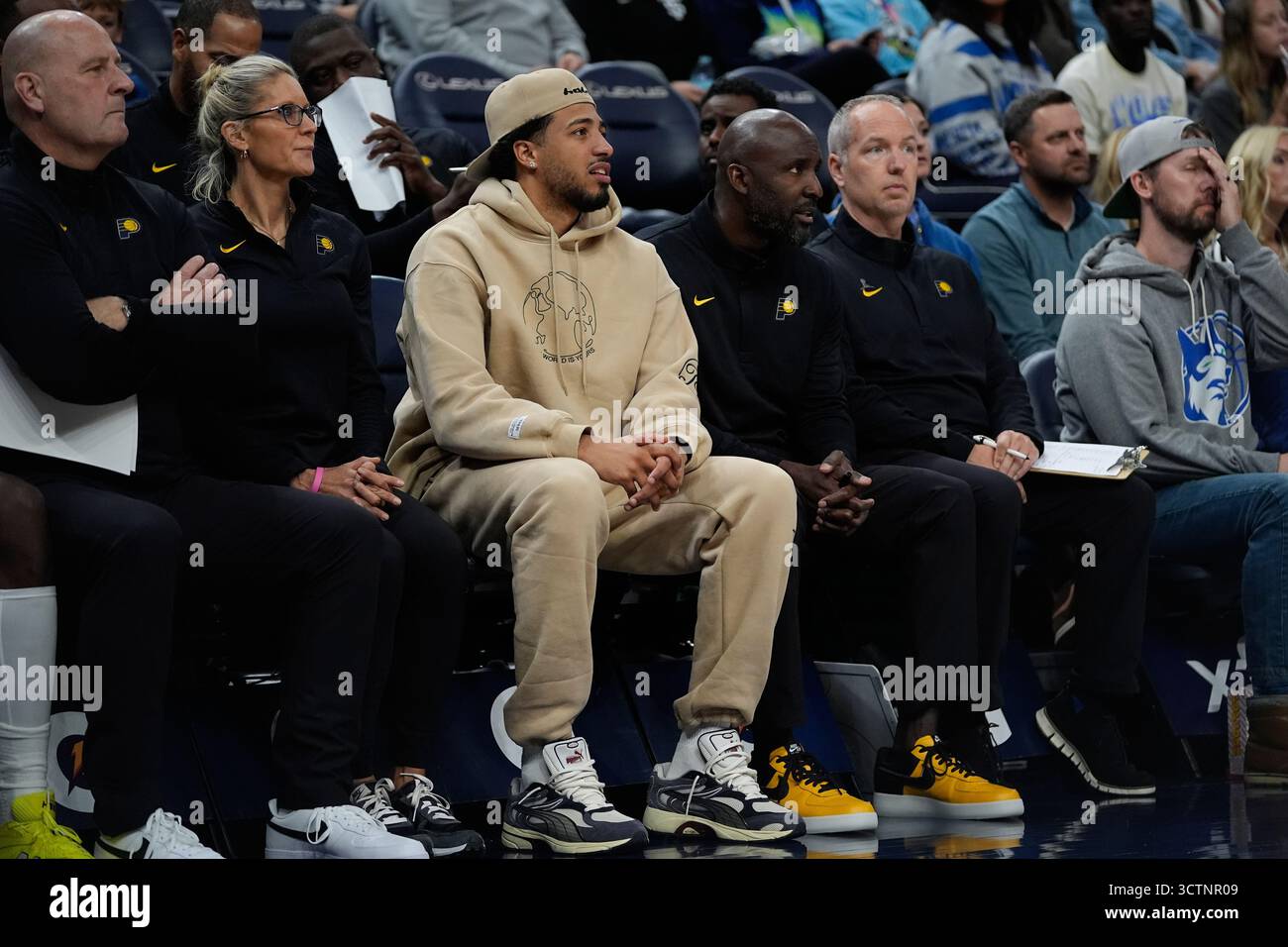 Indiana Pacers guard Tyrese Haliburton, middle, watches play during the ...